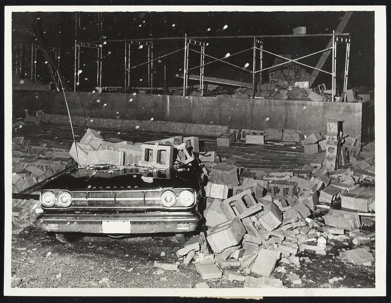 Collapsed Wall of warehouse in Needham Heights crushed car during storm ...