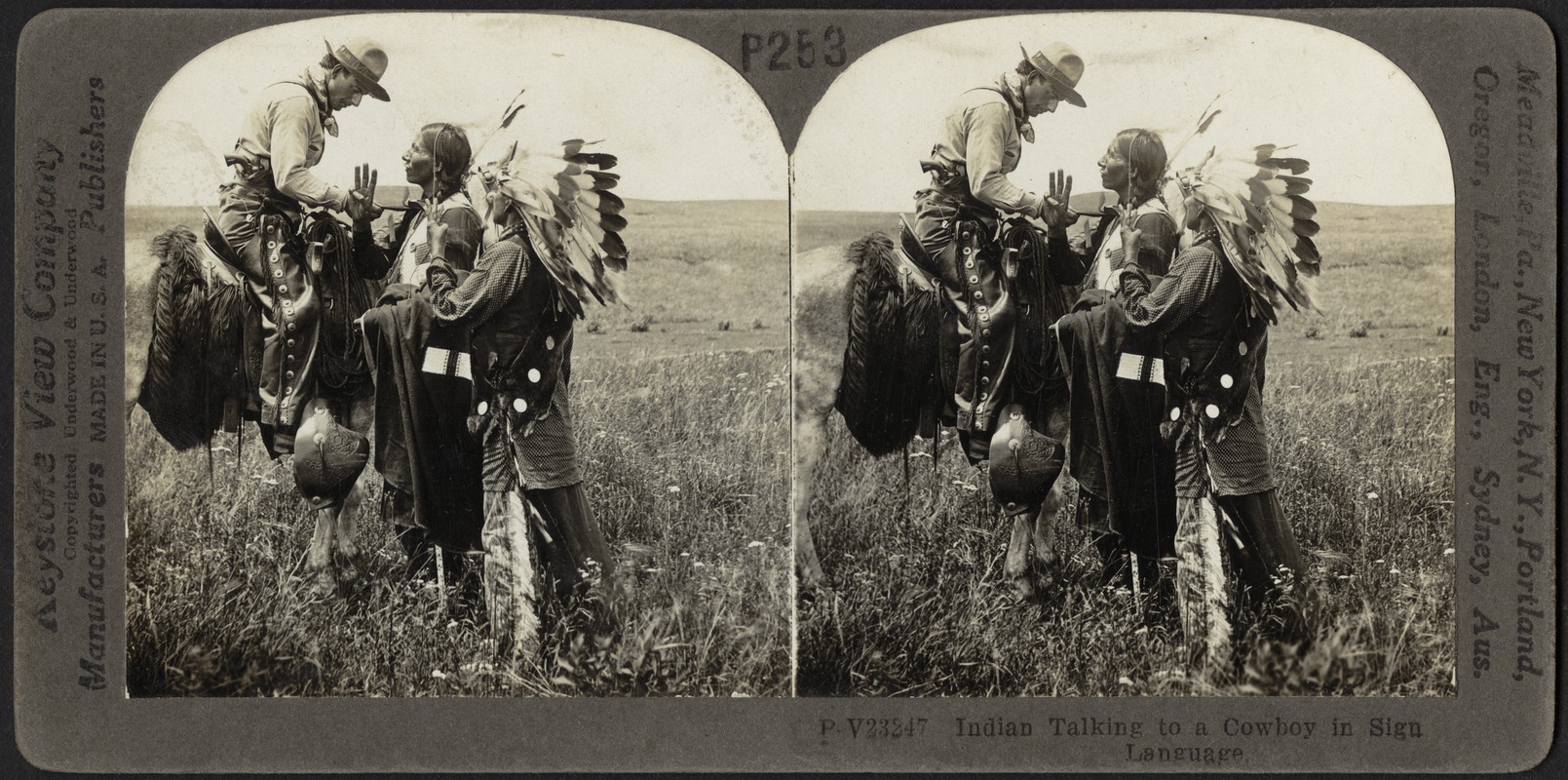 Indian talking to a cowboy in sign language - Digital Commonwealth