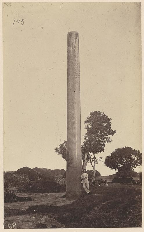Thomas Fraser Peppé posing with the Ashoka pillar at Lauriya Araraj ...