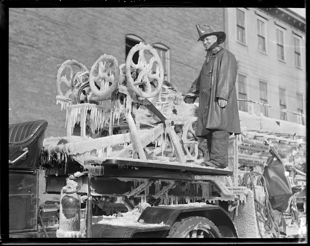 Fireman Tom Carney stands atop Ladder 9 at Charlestown Fire in zero ...