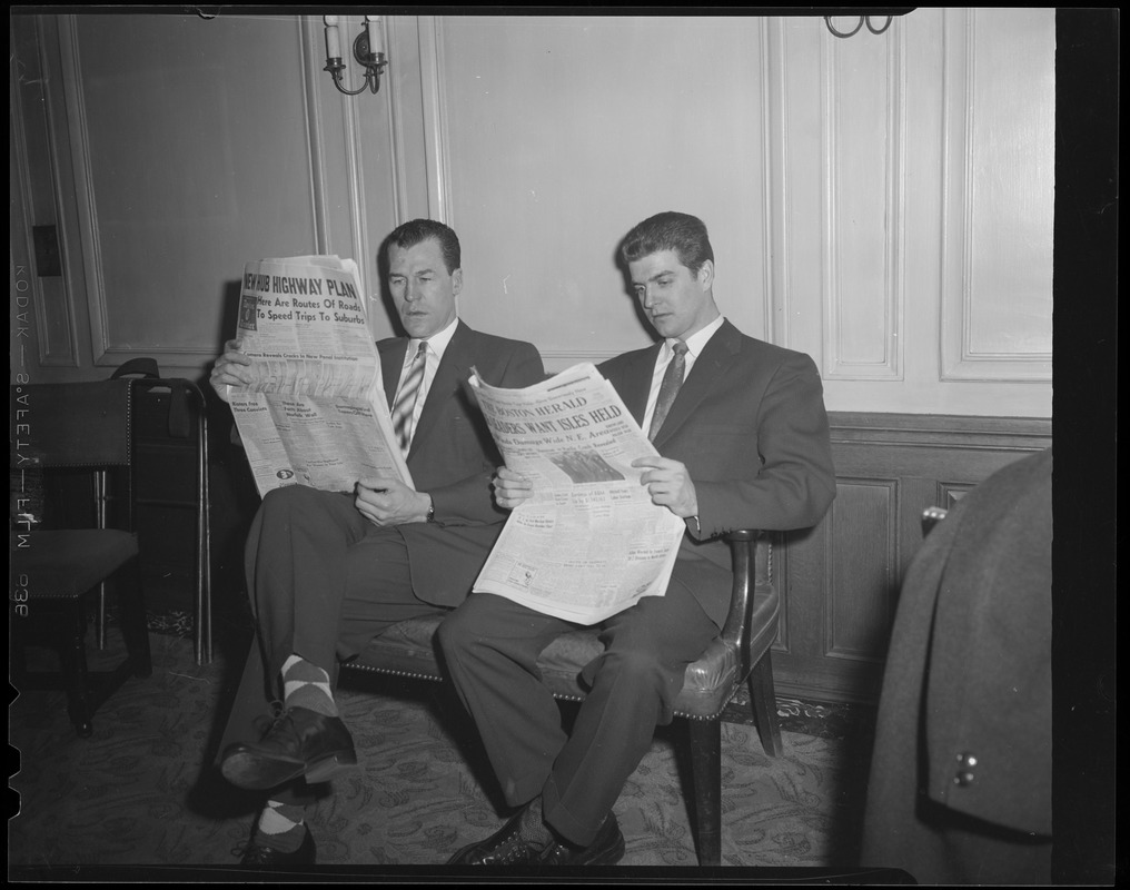 Herald people(?), reading the paper - Digital Commonwealth