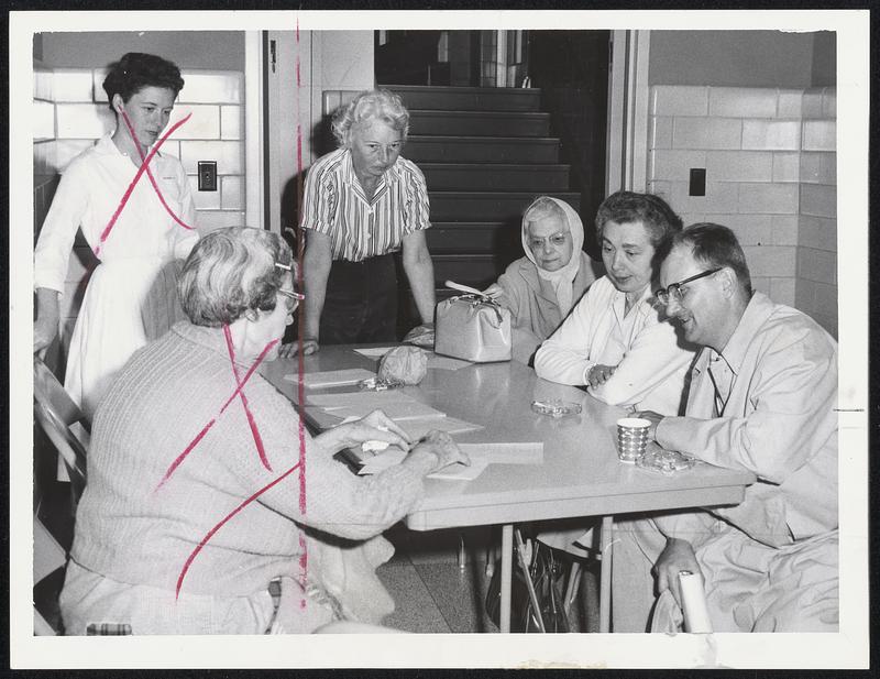 Evacuees Register at Dennisport Elementary School. From left: Mrs ...