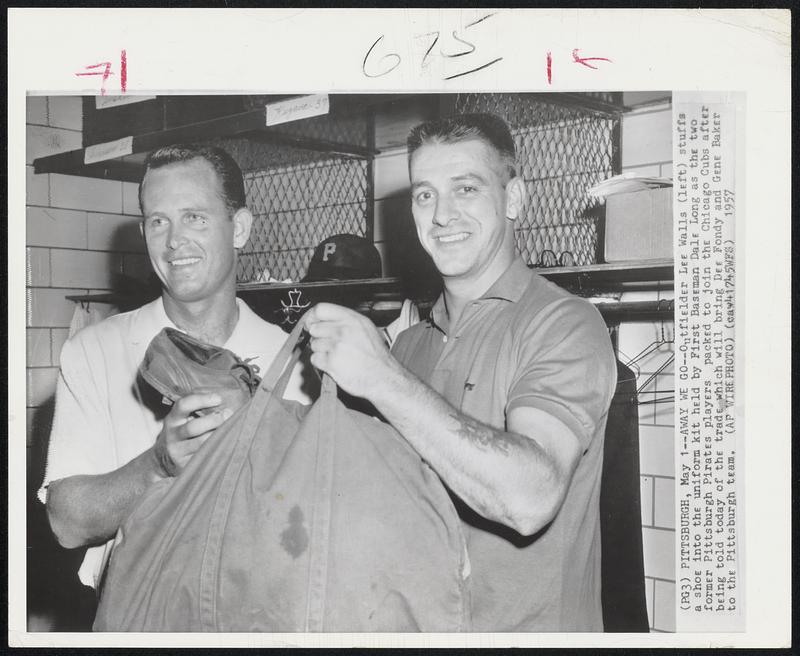 Pittsburgh – Away We Go – Outfielder Lee Walls (left) stuffs a shoe ...