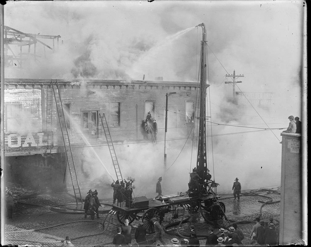 Remarkable fire at coal yard, South Boston, with water tower in action ...