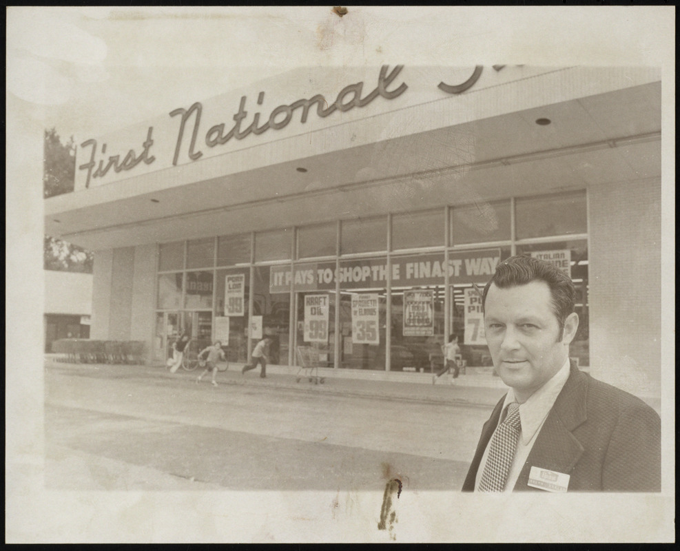 Ralph Denley in front of First National Store - Digital Commonwealth