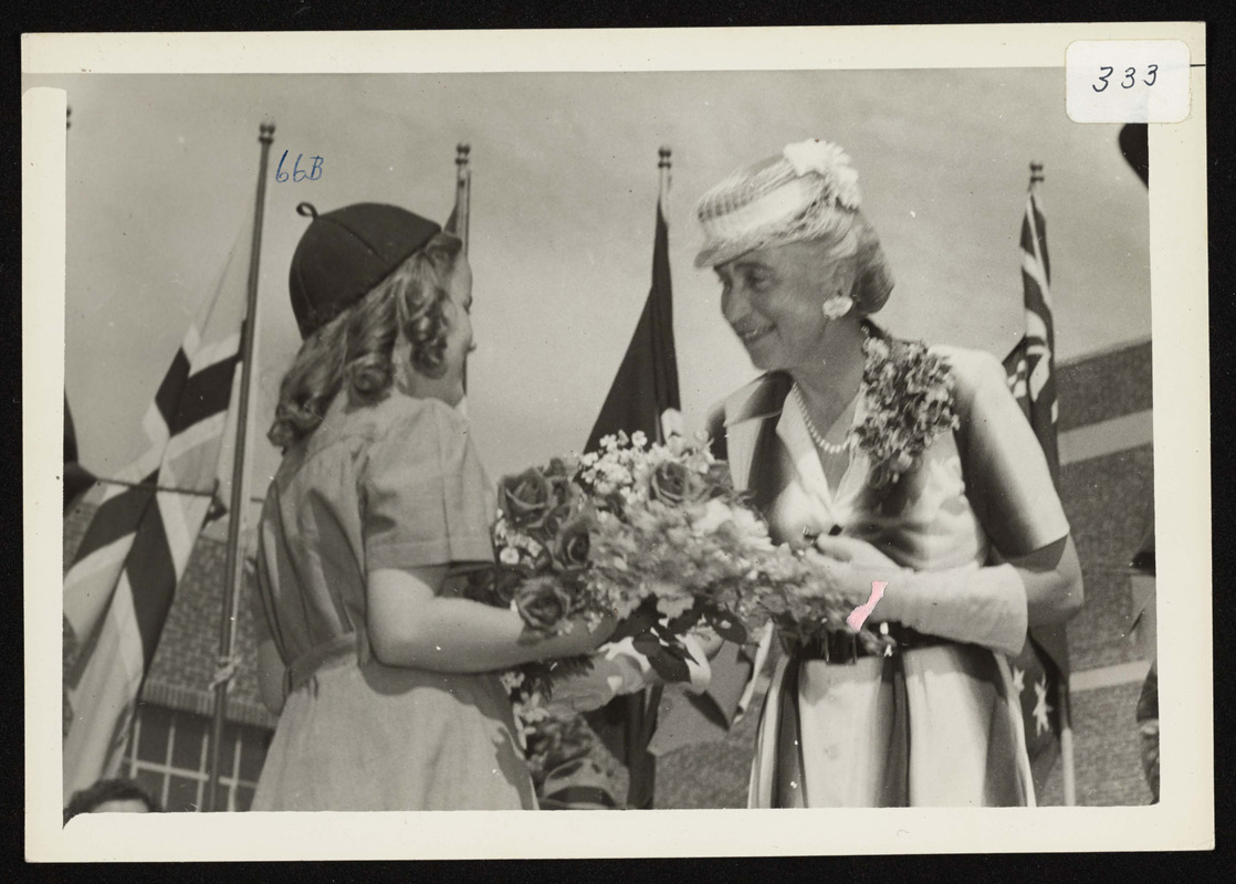 Welcome home General Patton, Elise Ostrom presents bouquet to Mrs ...