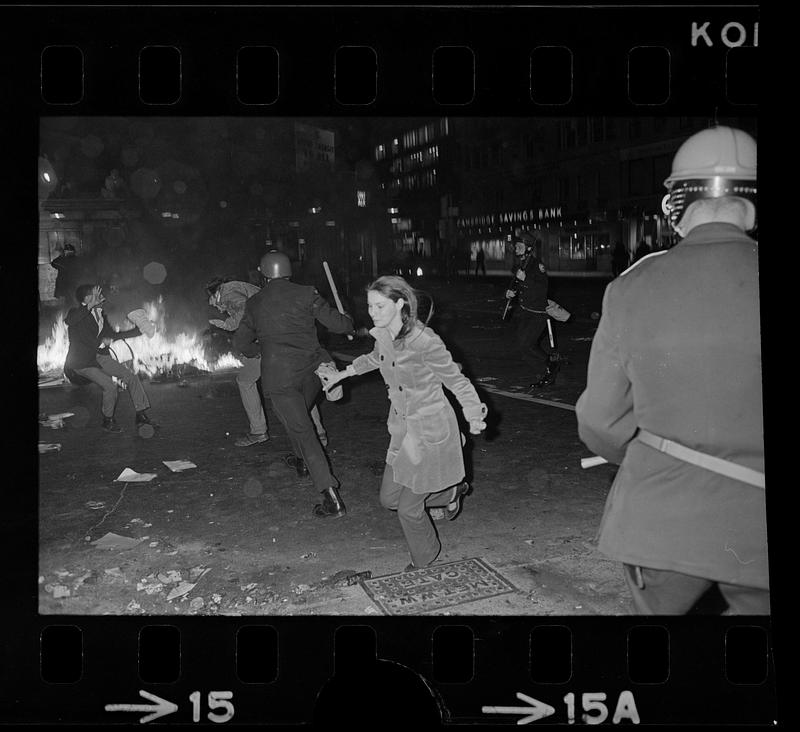 Harvard Square anti-war riot: Cop chases protester as another flees ...