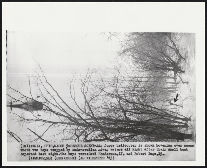 Xenia, Ohio -- Rescue Scene -- Air force helicopter is shown hovering ...