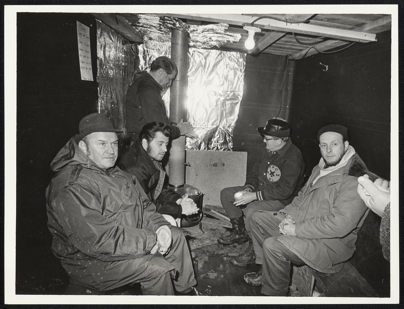 Inside of G.E. strike hut. Front left: Paul Ayers Danvers. Bob Comeau ...