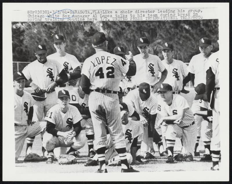 Like a choir director leading his group, Chicago White Sox manager Al ...