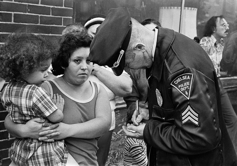 Chelsea Police Sgt. Larry Donovan interviews a fire victim - Digital ...