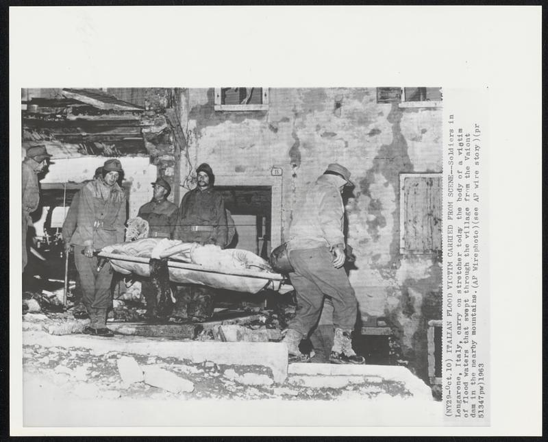 Italian Flood Victim Carried From Scene--Soldiers in Longarone, Italy ...