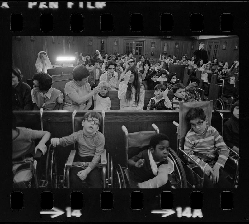 Orphan boys & girls at mass, Brighton - Digital Commonwealth
