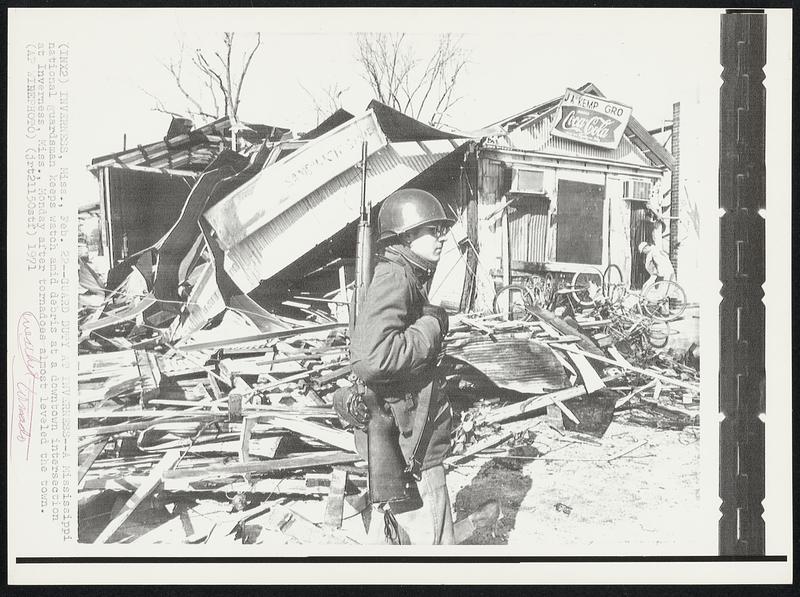 Guard Duty at Inverness--A Mississippi national guardsman keeps watch ...
