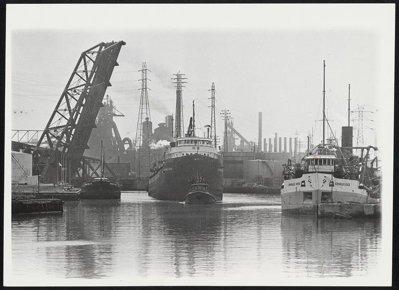 Loaded Water. Great Lakes freighters line the waterfront -- with a ...