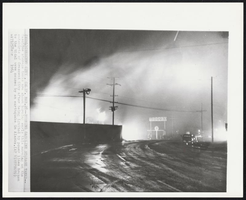 Burning Gasoline Storage Tanks--Gasoline storage tanks are shown ...