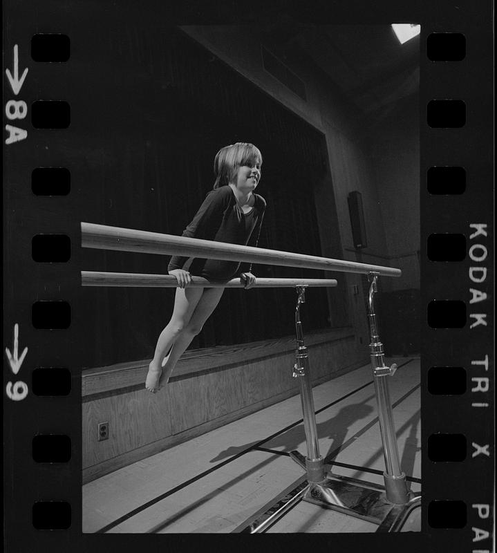 Bruce Irving's child doing gymnastics - Digital Commonwealth