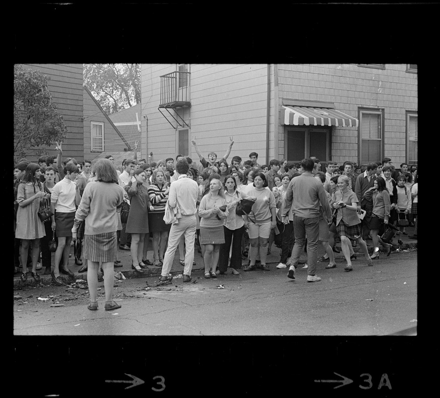 Crowd of students across the street from East Boston High School during ...