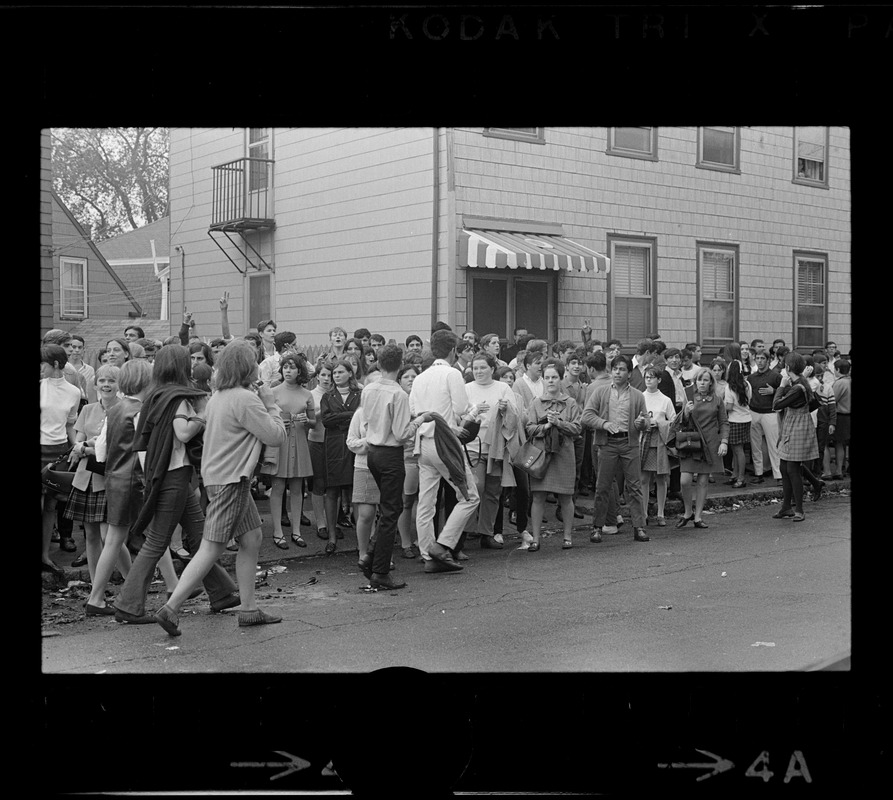 Crowd of students across the street from East Boston High School during ...
