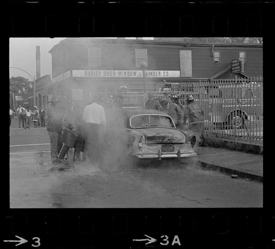 Car that was set afire in Roxbury at Zeigler St. and Harrison Ave ...