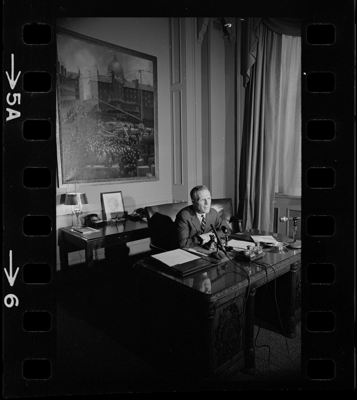Mayor White seated at his desk during his weekly press conference ...