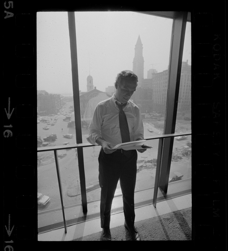 Mayor White standing by a window in his City Hall office overlooking ...