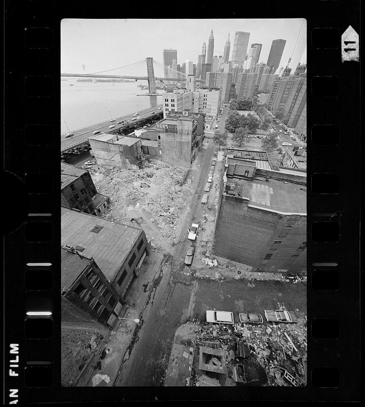 Brooklyn Bridge and New York skyline, rubble in foreground, New York ...