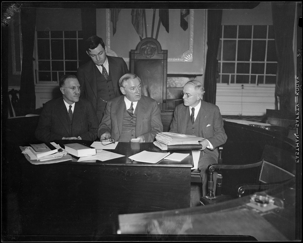 Gov. Curley shown with Charles P. Howard + Auditor Thomas H. Buckley ...