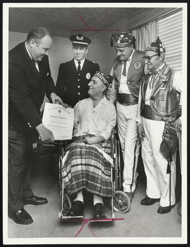 Joseph Addonizio of Winthrop, center, receives certificate making him ...