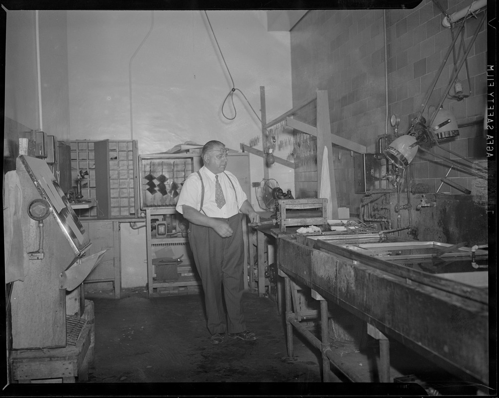 Man in the photo printing room, Boston Herald - Digital Commonwealth