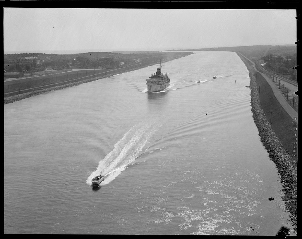 Boats and ship going through Cape Cod Canal - Digital Commonwealth