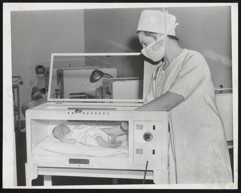 New Use for Incubators is demonstrated by this normal baby boy who is ...