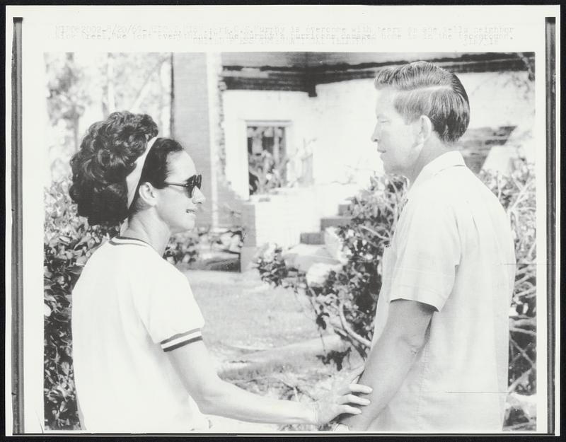 Biloxi, Miss. Mrs. C. C. Murphy is overcome with tears as she tells ...