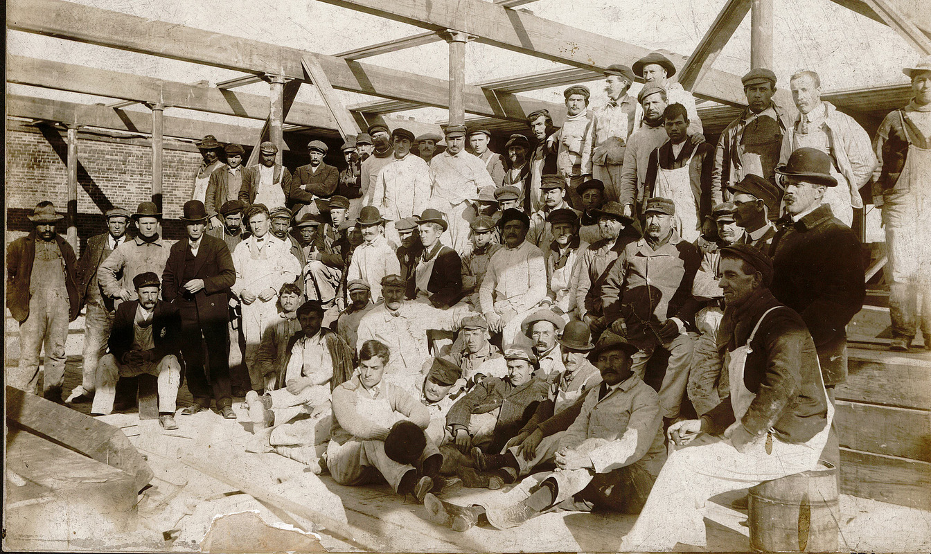 Workers engaged in building the Ayer Mill chimney - Digital Commonwealth