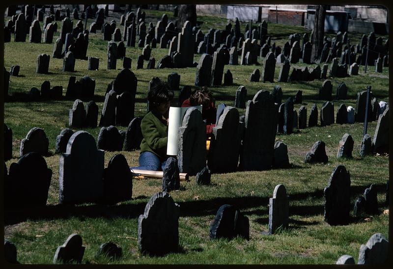 Two people taking gravestone rubbings, Granary Burying Ground, Boston ...