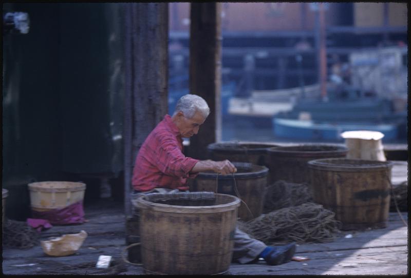 Man working with barrel - Digital Commonwealth