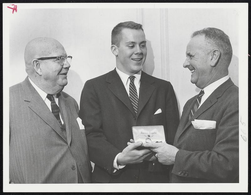 Blue’s Blue Ribbon winner, Quarterback Tom Singleton of Yale accepts ...