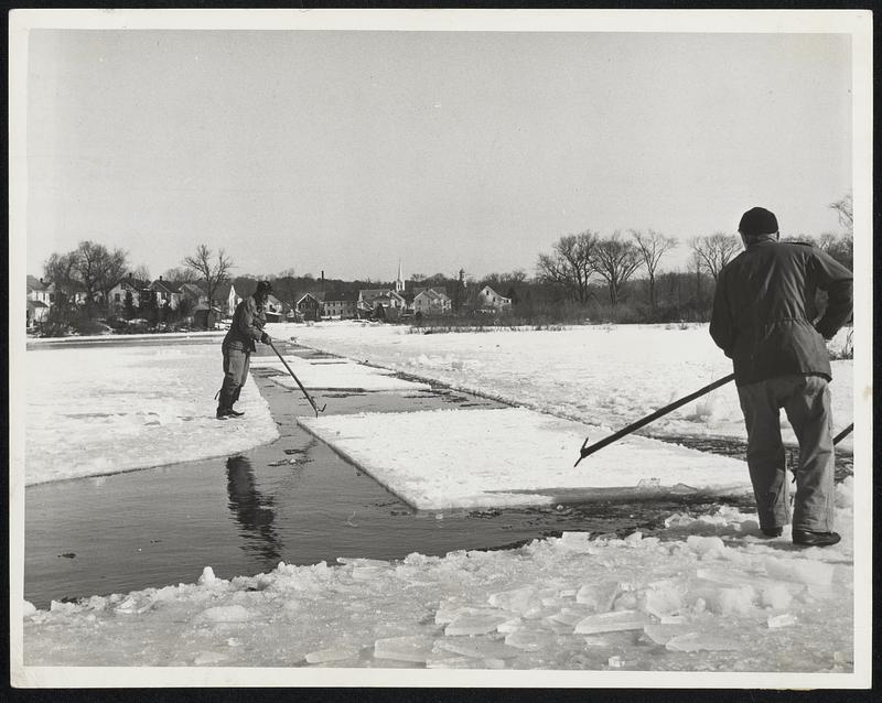 These men are pushing the ice around a curve in the canal. - Digital ...