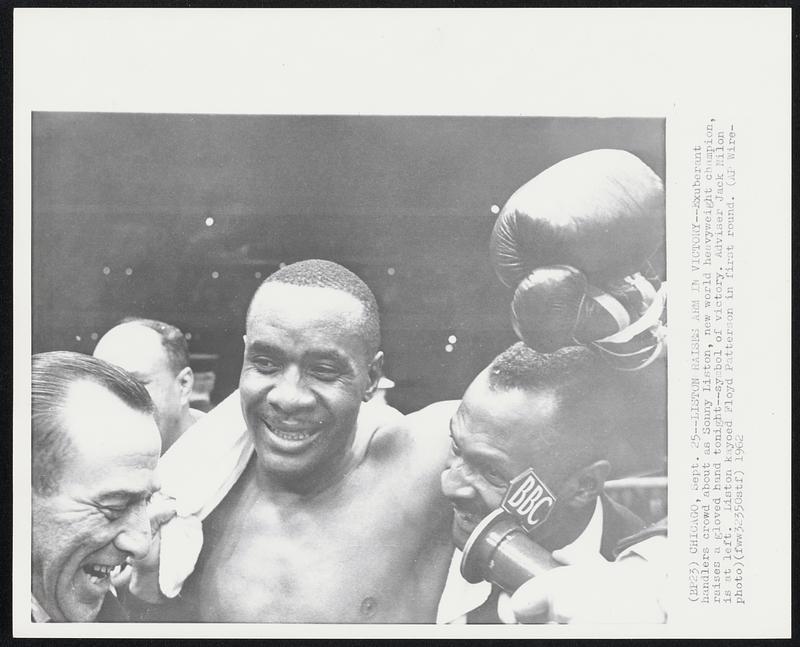 Liston Raises Arm in Victory--Exuberant handlers crowd about as Sonny ...