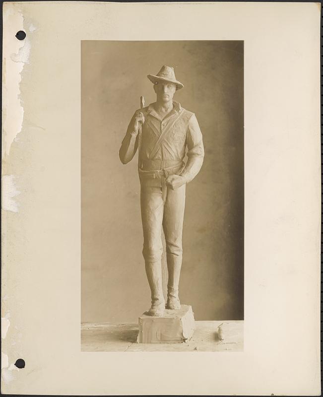 Sculpted figure of man with rifle - Digital Commonwealth