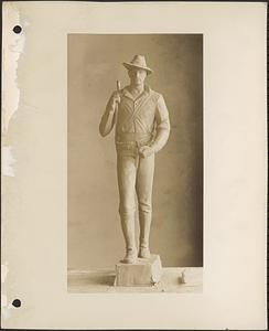 Sculpted figure of man with rifle - Digital Commonwealth