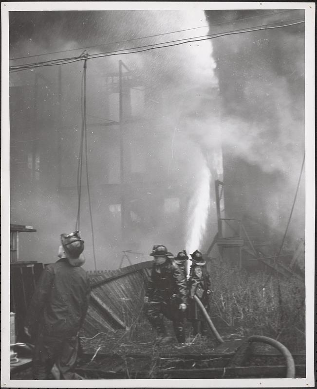 Boston fire fighters combatting building fire, East Boston - Digital ...