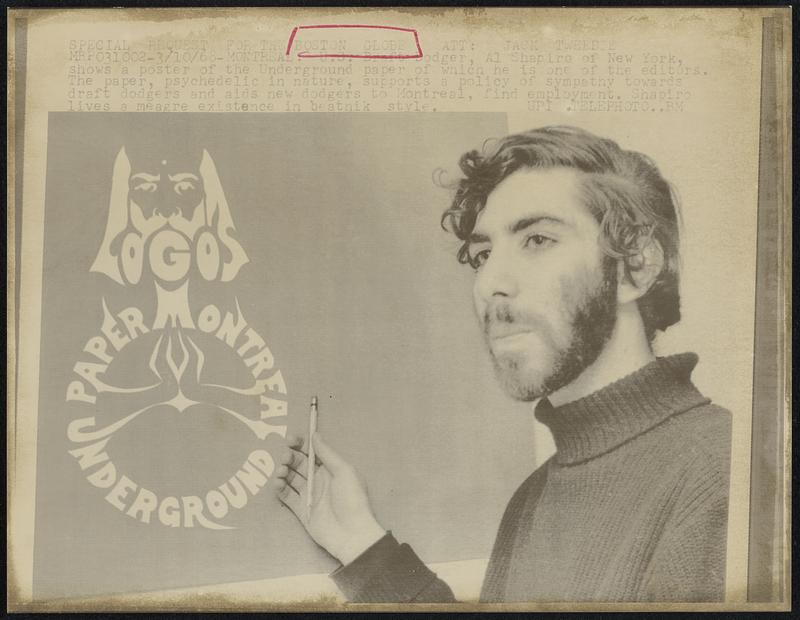 U.S. Draft Dodger, Al Shapiro of New York, shows a poster of the ...