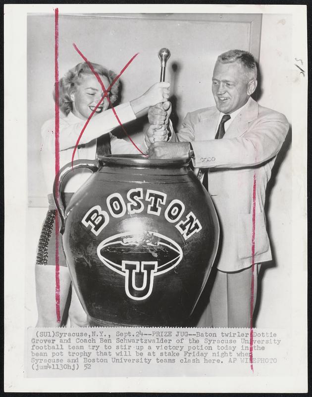 Prize Jug--Baton twirler Dottie Grover and Coach Ben Schwartzwalder of ...