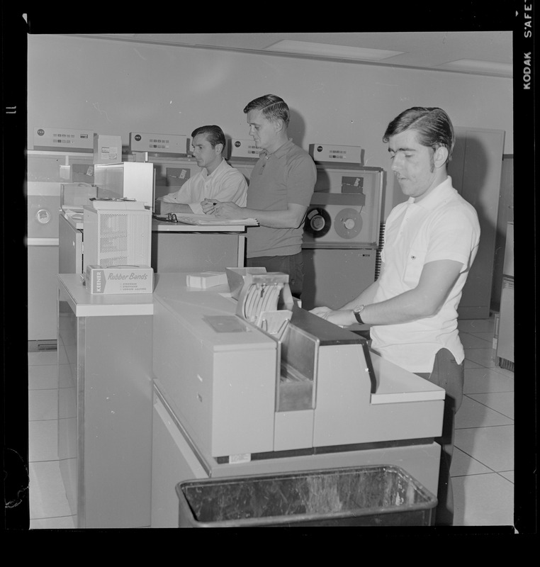 Three men working with computers - Digital Commonwealth