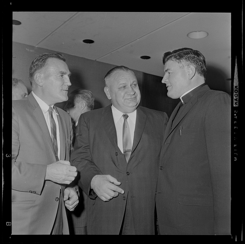 Joe Zabilski and Msgr. George Kerr flank Dr. Ed Molinski at the dinner ...