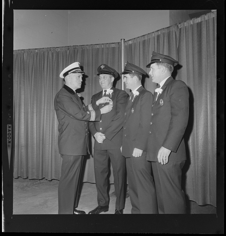 Boston Fire Department Chief William Terrenzi congratulates Department ...