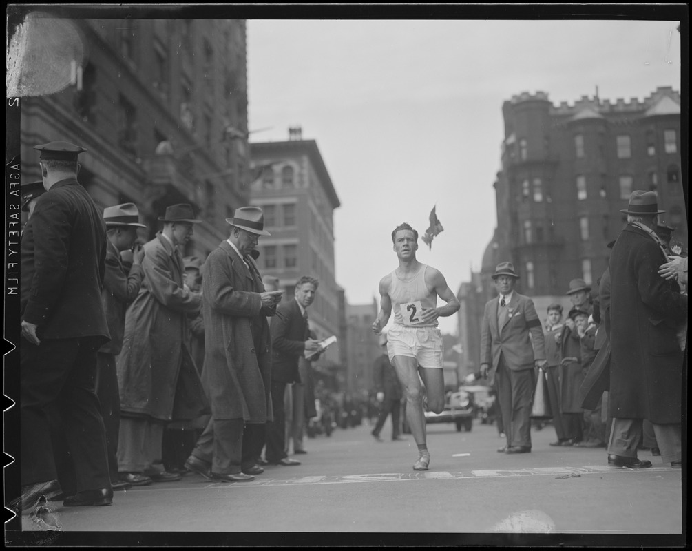 Runner no. 2 crossing the finish line - Digital Commonwealth