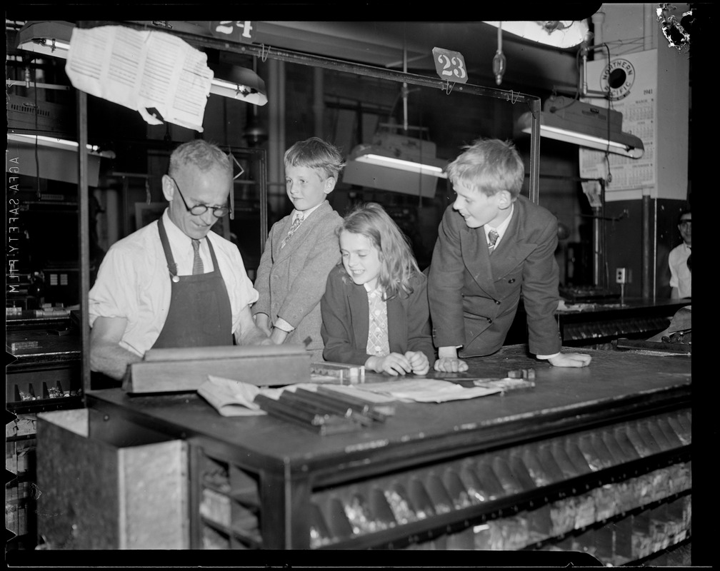 Clarence DeMar in print shop with kids - Digital Commonwealth