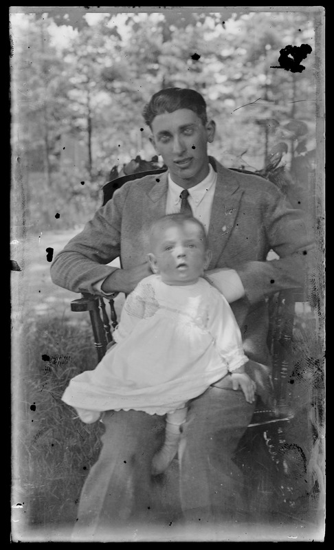 Man with baby - Digital Commonwealth